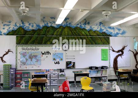 Desks are spaced out in a classroom at Aikahi Elementary School in ...