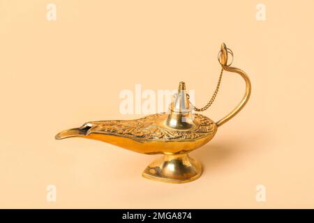 Aladdin lamp of wishes for Ramadan on blue background Stock Photo - Alamy