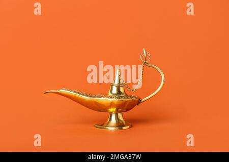Aladdin lamp of wishes for Ramadan on blue background Stock Photo - Alamy