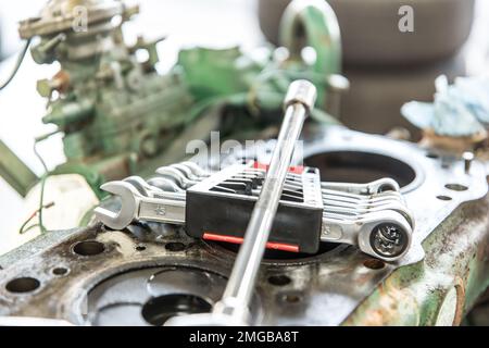 Japanese factory doing marine engine repair overhaul Stock Photo - Alamy