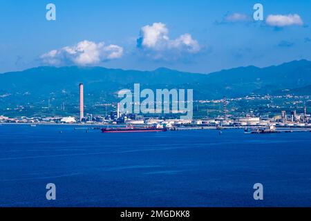 The industrial plants and the port of the Milazzo refinery, seen over ...