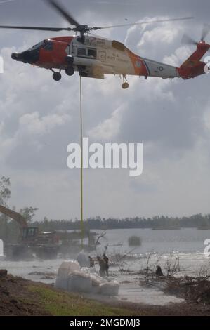 Aircrafts - Sand Baggers - 26-HK-57-104. Military personnel preparing ...