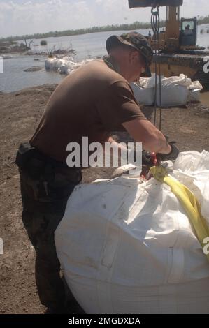 Aircrafts - Sand Baggers - 26-HK-57-104. Military personnel preparing ...