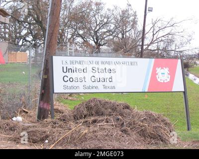 Station Sabine, Texas - 26-HK-2-1. Coast Guard on front loader with ...