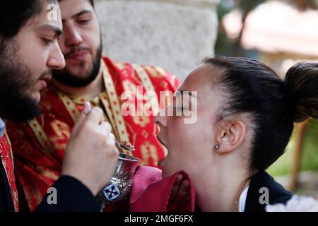 Greek Orthodox Holy Communion With Spoon Stock Photo - Alamy