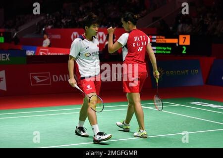 Yeung Pui Lam of Hong Kong, with Yeung Nga Ting, serves during a ...