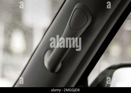 Modern car grab handle, car interior details. Car grab handler for the ...