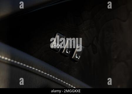 Memory car seat position buttons. Adjusting seat Stock Photo - Alamy