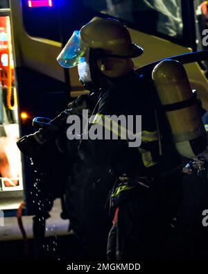 A Royal Saudi Air Force firefighter fits his helmet between two U.S ...