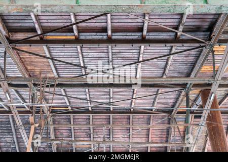 Gable roof truss of a large, vintage factory hall. Roofing construction ...