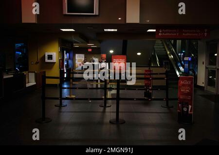 Closed movie theater lobby - empty and barricaded Stock Photo - Alamy