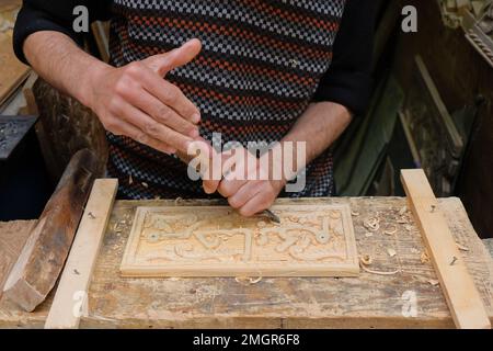 Fez, Morocco - woodworker at a woodshop in Fes el Bali medina. Male ...