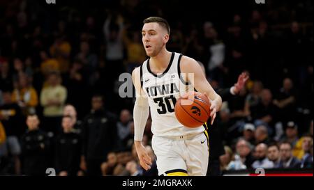 Iowa guard Connor McCaffery drives up court during the second half of ...