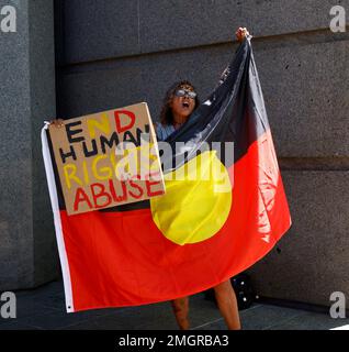 Perth, WA, Australia. January 26th 2023. Crowd listens to a speaker and ...
