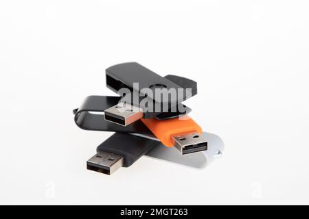 USB flash drive different usb keys stacked in a pyramid on white ...