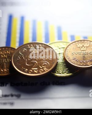 Swedish coins on an invoice from the electricity network company ...