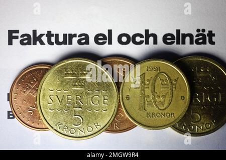 Swedish coins on an invoice from the electricity network company ...