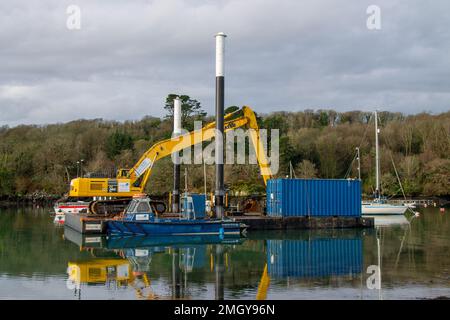 Mechanical Excavator on floating pontoon Stock Photo - Alamy