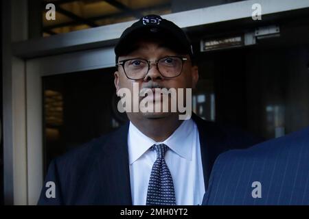 Mohammed Nuru, director of San Francisco Public Works, center, walks in ...