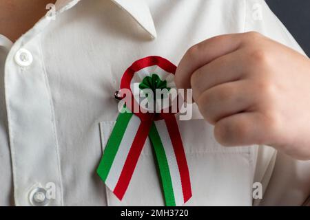 Hungarian tricolor cockade with white shirt Stock Photo - Alamy