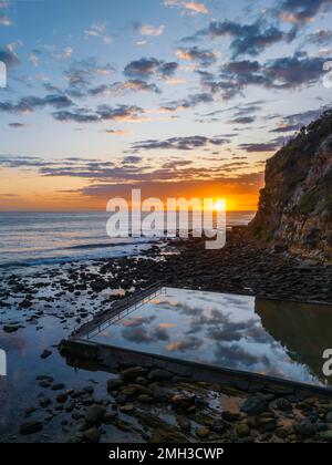 Aerial sunrise seascape with clouds at Macmasters Beach on the Central ...