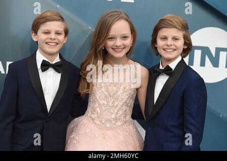 Cameron Crovetti, from left, Ivy George, and Nicholas Crovetti arrive ...