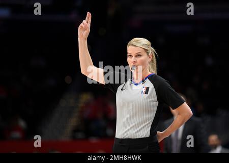 Referee Jenna Schroeder gestures during the second half of an NBA ...