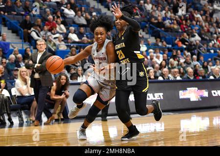 Connecticut's Christyn Williams, left, and Wichita State's Vendela ...