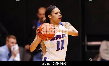 DePaul guard Sonya Morris looks to pass the ball against Marquette ...