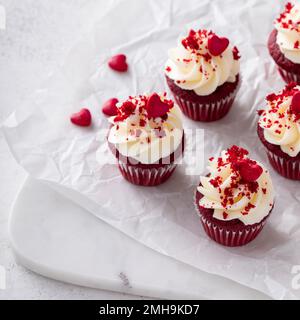 Red velvet cupcakes on a marble board Stock Photo - Alamy