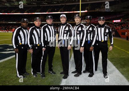 Umpire Undrey Wash (96) and line judge Tim Podraza (47) pose for ...