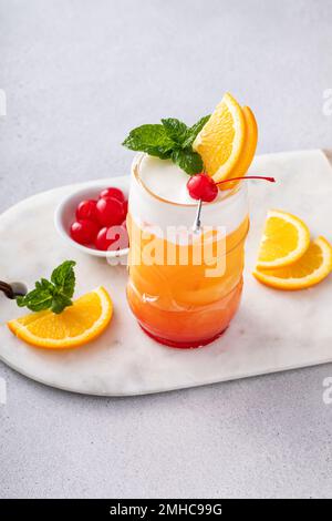 Zombie tropical cocktail with rum in tiki glasses Stock Photo - Alamy