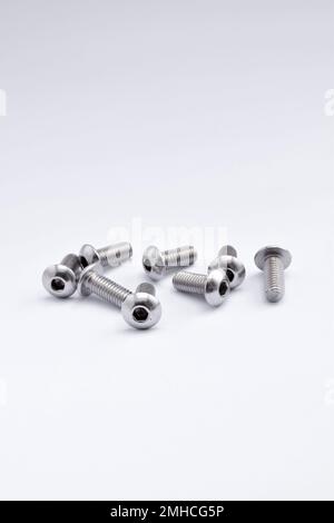 Group of button hex head screw stainless steel isolated on white ...
