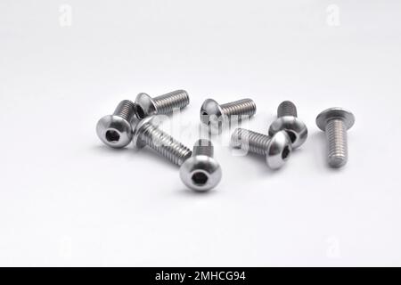 Group of button hex head screw stainless steel isolated on white ...