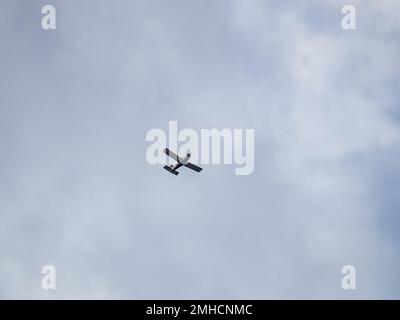 Small ultralight airplane with overhead wing and single propeller ...