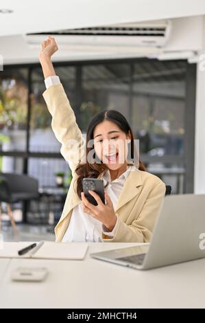 Portrait, Overjoyed and happy millennial Asian woman in comfy clothes ...