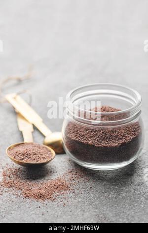 Jar of India black kala namak salt. Healthy food concept. Speciality ...