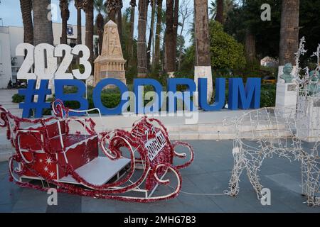 Large Blue 'BODRUM' Sign in Outdoor Public Space with Palm Trees Stock ...