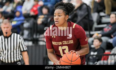 Boston College's Taylor Soule (13) grabs a rebound over her teammate ...