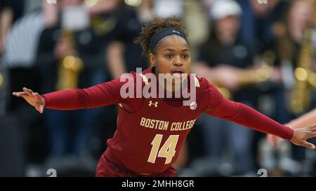 Boston College's Marnelle Garraud (14) defends Miami's Lashae Dwyer (13 ...
