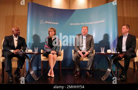 From left to right, Ted Colbert President and CEO of Boeing Global Services, Leanne Caret ...