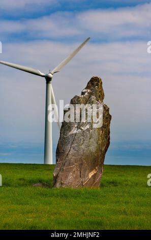 A scenic view of wind turbines in a field during a mesmerizing ...