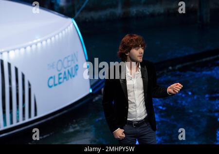 Young Dutch inventor Boyan Slat, right, unveils the Interceptor, in ...