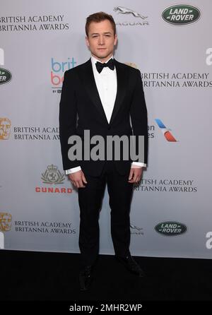 Taron Egerton arrives at the BAFTA Los Angeles Britannia Awards at the ...