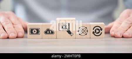 Wooden blocks with symbol of online streaming concept Stock Photo - Alamy