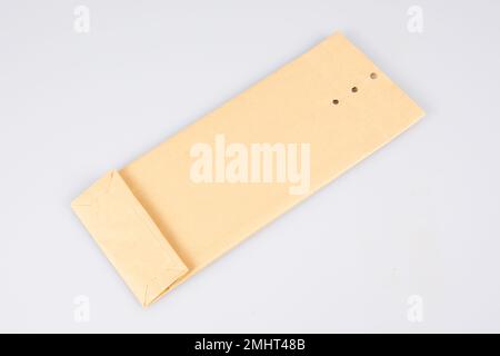 Kraft paper envelope folder perforated closure isolated on white ...