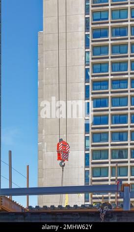 Tower cranes but against backdrop of construction Stock Photo - Alamy