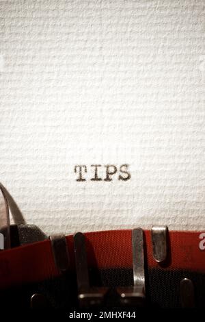 Tips word written with a typewriter Stock Photo - Alamy
