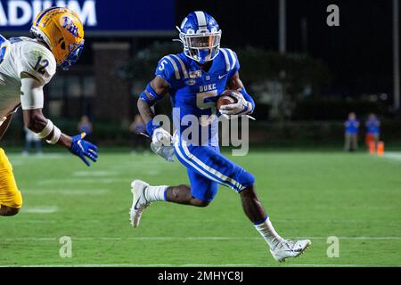 Duke's Jalon Calhoun (5) carries the ball during an NCAA college ...