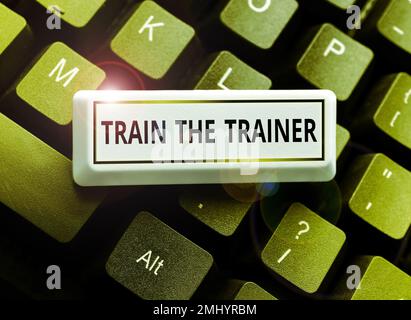 Sign displaying Train The Trainer, Word Written on identified to teach ...